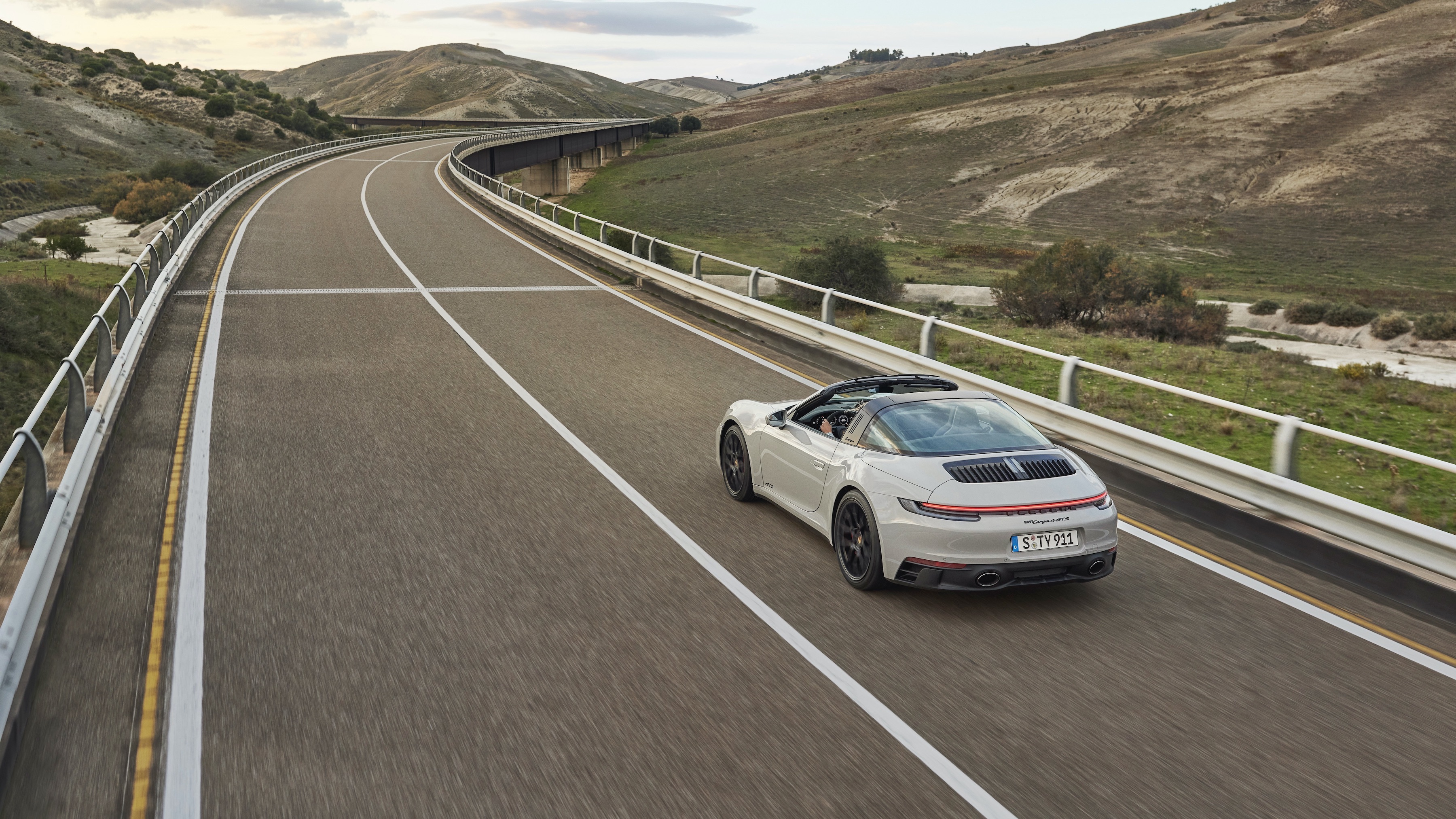 Porsche AG continues positive business development in first half-year ...
